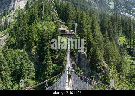 The suspension bridge Handeggfallbruecke, Guttannen, Bernese Oberland ...