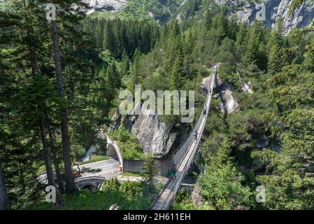 The suspension bridge Handeggfallbruecke, Guttannen, Bernese Oberland ...