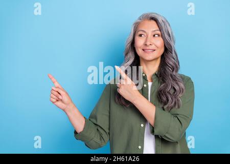 Photo of dreamy shiny lady dressed pink shirt smiling looking empty ...