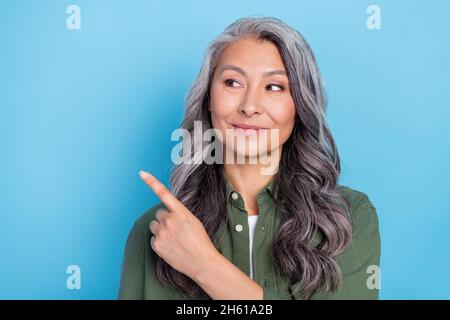 Photo of sweet thoughtful retired woman blue sweater arm spectacles ...