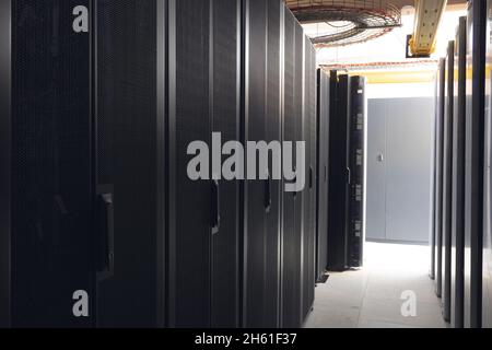 Data center with multiple rows of fully operational server racks Stock ...