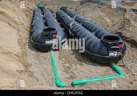 Installation of a rainwater cistern, North Rhine-Westphalia, Germany ...