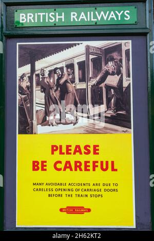 A vintage British Railways poster advertising Butlins holidays by rail ...