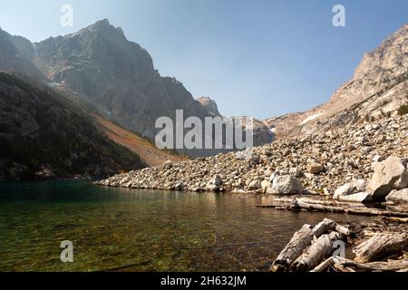 Mount Wister rising high above Shoshoko Falls as forest fire smoke sets ...