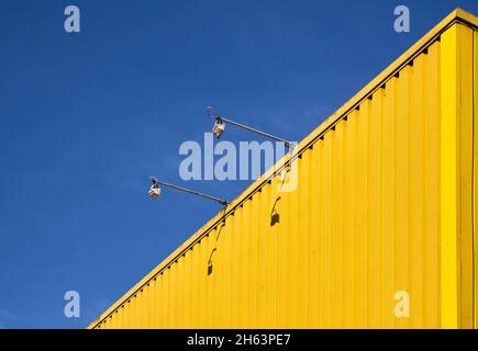 yellow warehouse,blue sky,industrial park Stock Photo - Alamy