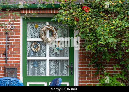Traditionally Decorated House Door In A Typical Paroja Tribe Village In ...