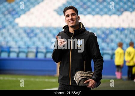 Theo Corbeanu #23 of Sheffield Wednesday runs forward with the ball ...