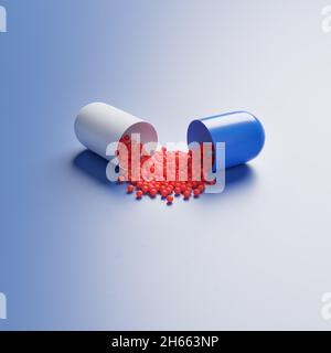 An open pill capsule spilling the active ingredient Stock Photo - Alamy