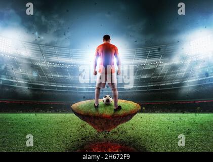 fiery soccer ball on green field Stock Photo - Alamy