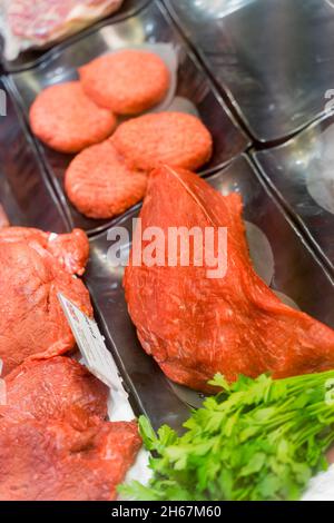 Fresh raw beef meat fillet shish kebab on skewers.Kiwi soaked meat ...