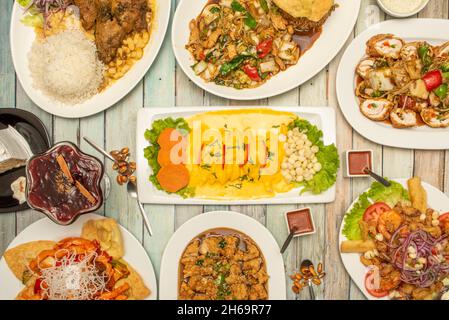 Set of typical Peruvian food recipes, anticuchos, fish jelly, lomo ...
