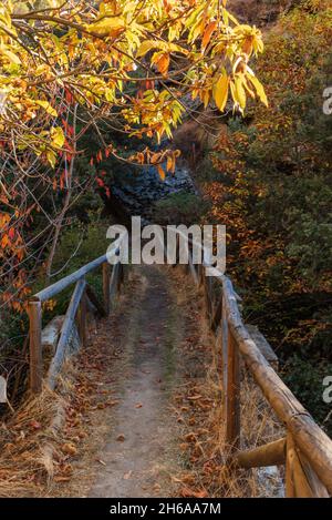 Bridge over the Lanjaron river in Sierra Nevada, through which a path ...