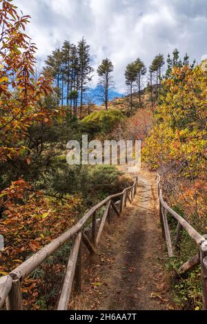 Bridge over the Lanjaron river in Sierra Nevada, through which a path ...