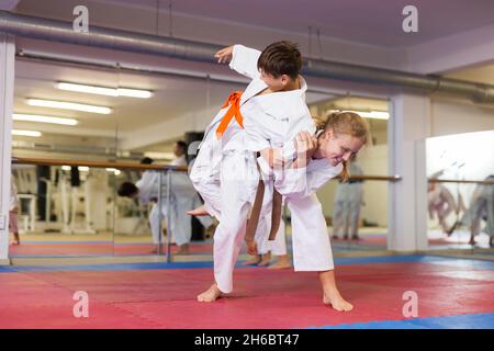 Teenager children practicing new self defense moves Stock Photo - Alamy