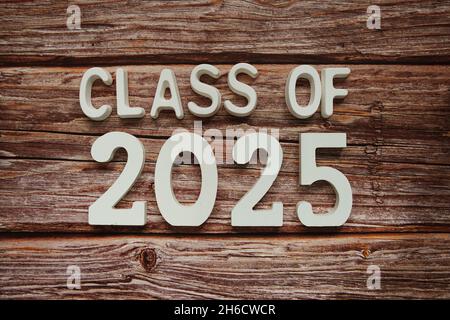 Class of 2025 alphabet letters on wooden background Stock Photo - Alamy