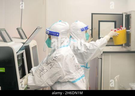 Heihe, China's Heilongjiang Province. 15th Nov, 2021. A medical worker ...