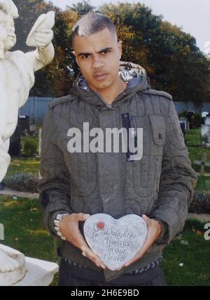 A photo from the family of Mark Duggan with his girlfriend Simone ...