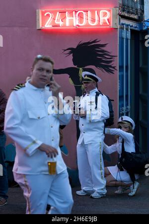 Hundreds of movie Fans dressed as stars from the movie Top Gun and ...