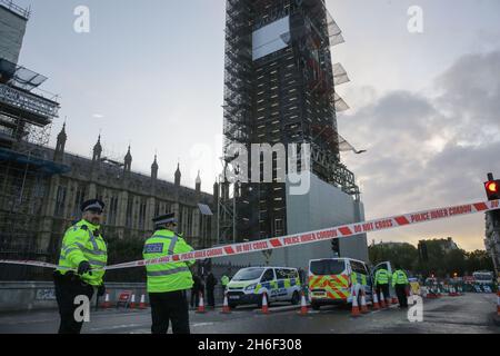 Extinction Rebellion protestor scales Big Ben tower dressed as Boris ...