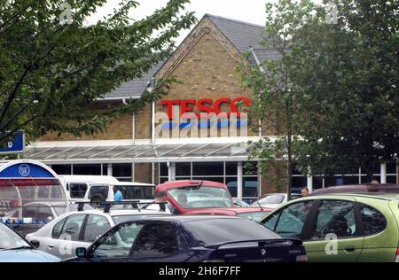 Security tags on meat at tesco, ashford, uk Stock Photo - Alamy