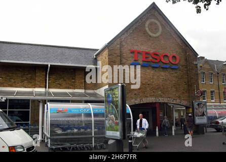 Security tags on meat at tesco, ashford, uk Stock Photo - Alamy