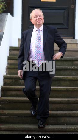 Former political journalist John Sergeant leaves his home after ...