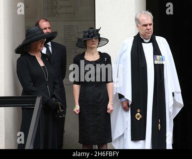 Sally, the wife of Lieutenant Colonel Rupert Thorneloe, center, his ...