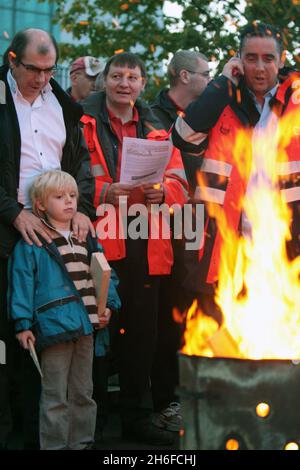 Postal workers and supporters from other unions form a picket line ...