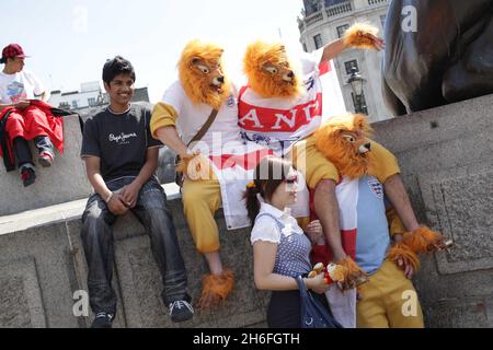 England and Mexican football fans enjoyed the hot sun in Trafalgar ...
