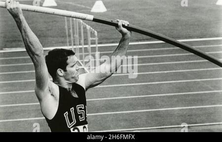 American track and field athlete Bill Toomey winning the 1500-meter run ...