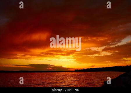 panorama of a fiery sunrise - sunset in the sky Stock Photo - Alamy