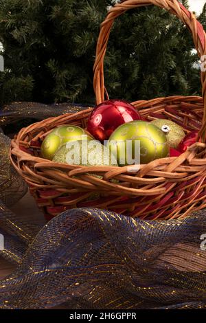 Christmas decorations in basket isolated on white Stock Photo - Alamy