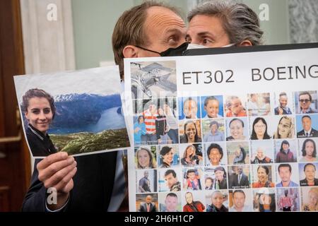 Michael Stumo, left, holds a photo of his daughter Samya Rose Stumo ...