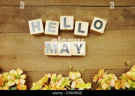 Hello May alphabet letters on green glitter background Stock Photo - Alamy