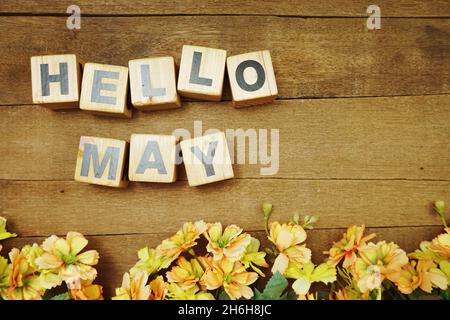 Hello May alphabet letters on wooden background Stock Photo - Alamy