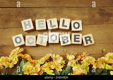 Hello October alphabet letters on wooden background Stock Photo - Alamy