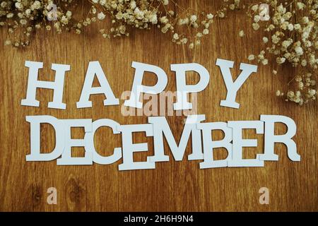 Happy December alphabet letters on blue background Stock Photo - Alamy