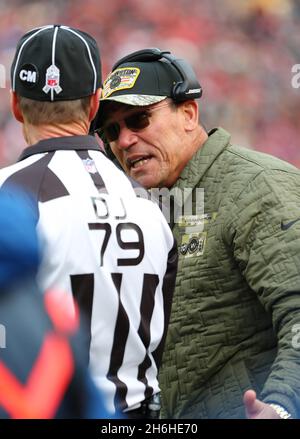 Down judge Kent Payne (79) has a discussion with Jacksonville Jaguars ...