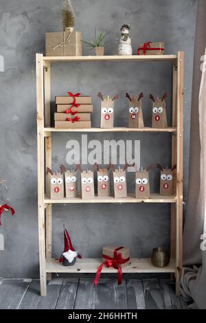 Christmas Advent Calendar. Craft gifts on blue background. Festive ...