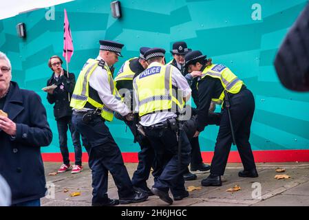 police carefully carrying a protestor of the road, Protest against Lord ...
