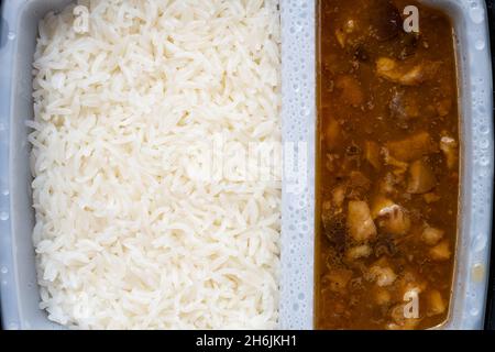 fresh self cooking fast food of rice with egg tart and yogurt Stock ...