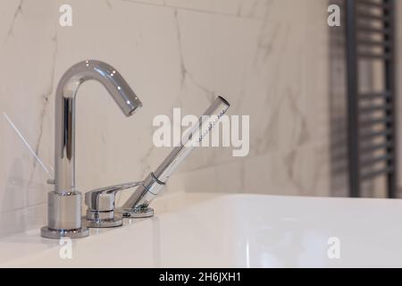 Detail of shower mixer faucet. Bath mixer tap close up. Shower panel ...