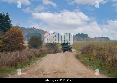 British army MAN HX3 8x8 with a JCB Forklift as cargo in action ...