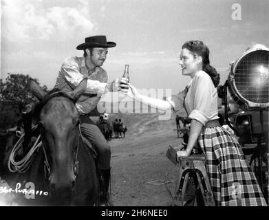 Zachary Scott, Alexis Smith, on-set of the film, "Stallion Road ...