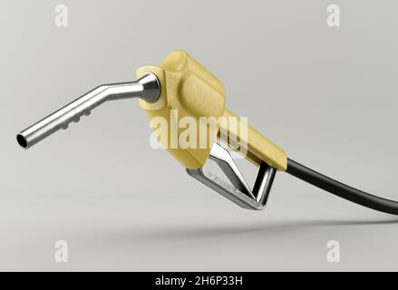 A regular yellow and metal fuel pump nozzle and pipe on an isolated ...