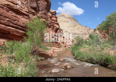 Beautiful view of the Fremon River flowing in rugged rock facade in ...