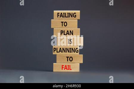Failing to plan or planning fail symbol. Wooden blocks with words ...