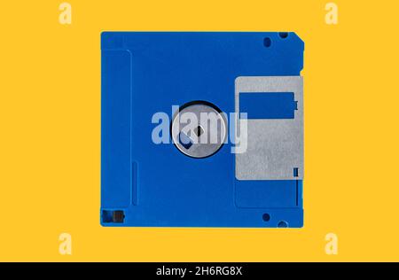 Blue and yellow floppy disk isolated on white background Stock Photo ...