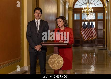 Prime Minister Justin Trudeau listens at a press conference in Ottawa ...
