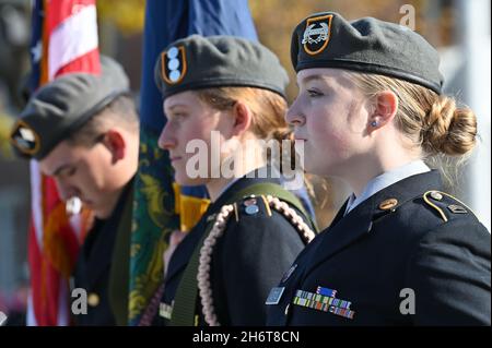 Members of the Spaulding High School Jr. ROTC give a 21-gun salute ...